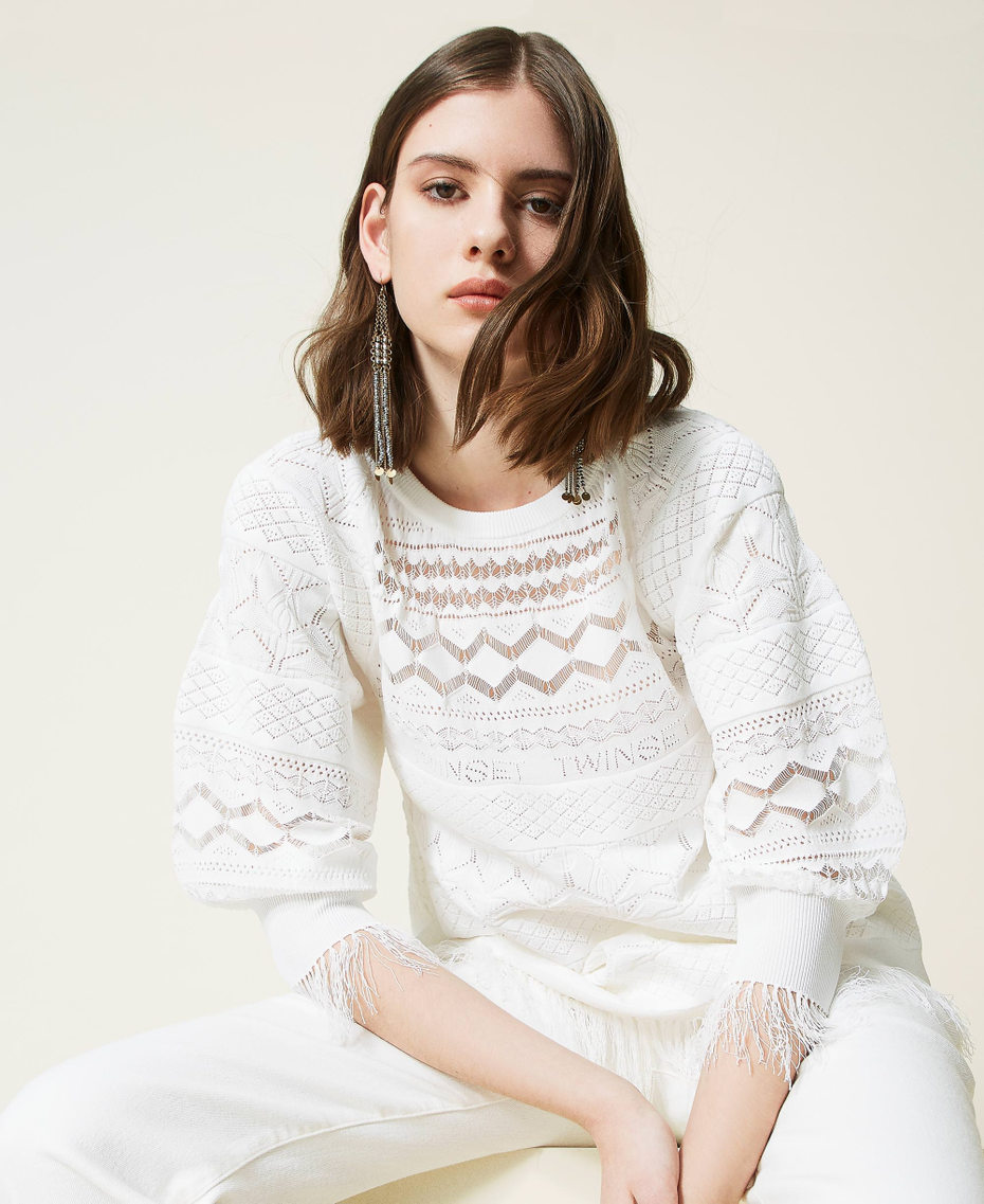 Lace stitch jumper with fringes