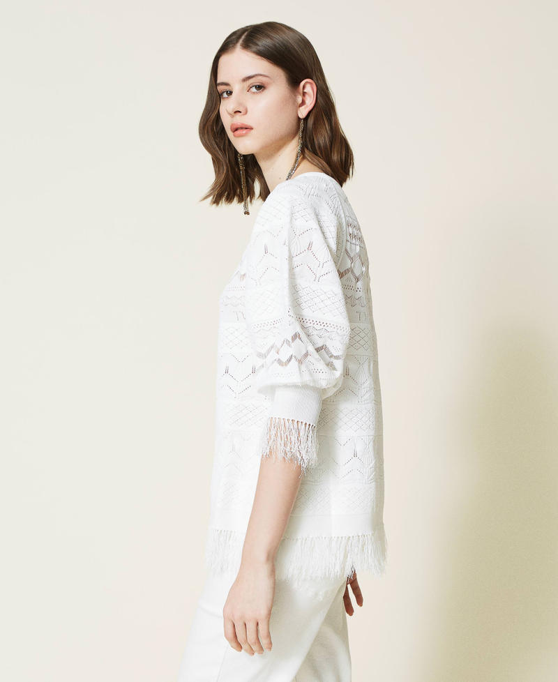 Lace stitch jumper with fringes