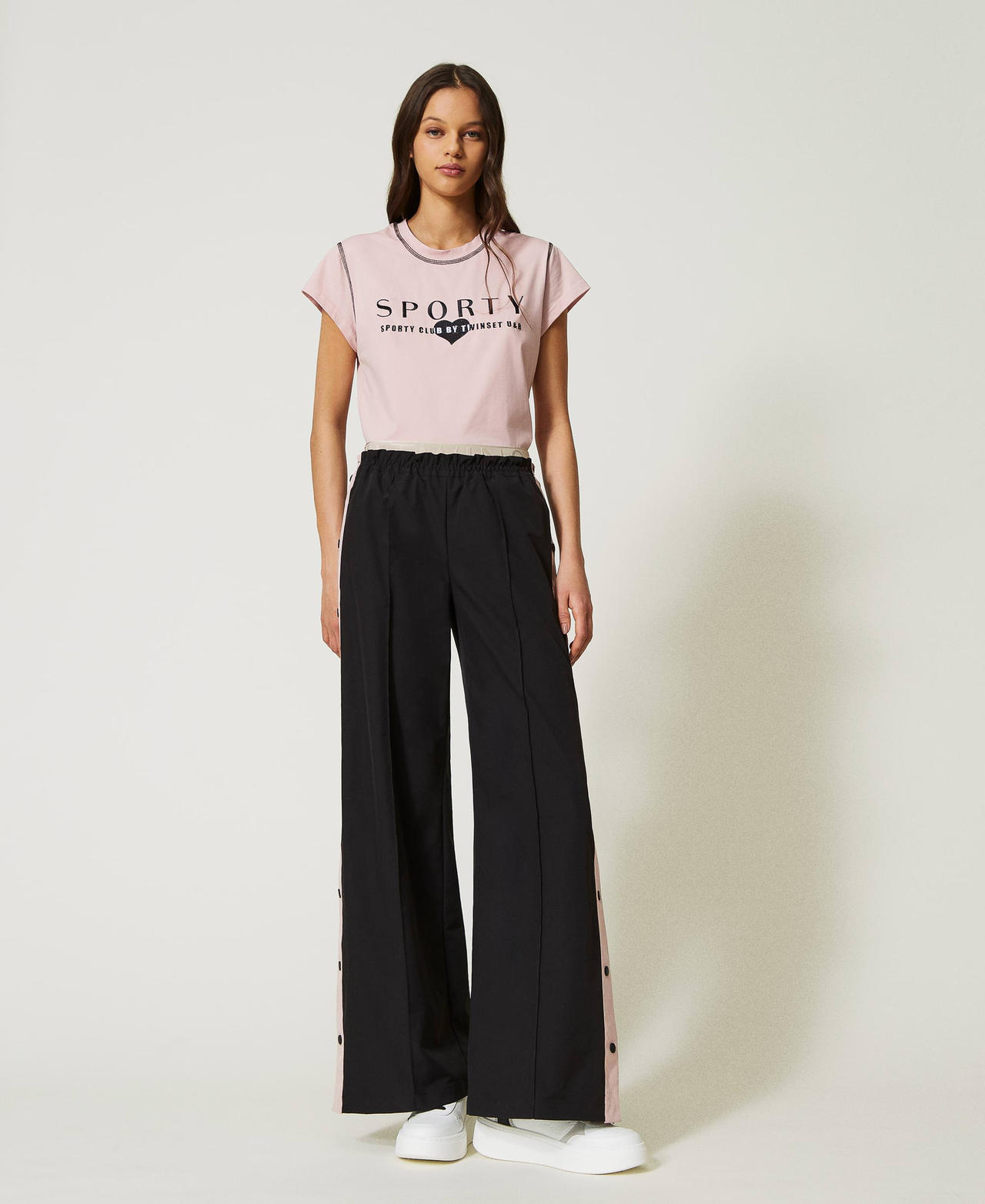 Wide trousers with side buttons Woman, Patterned | TWINSET Milano